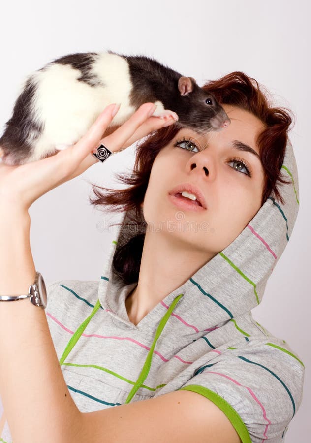 Girl playing with a rat stock image. Image of adult, head - 12224725