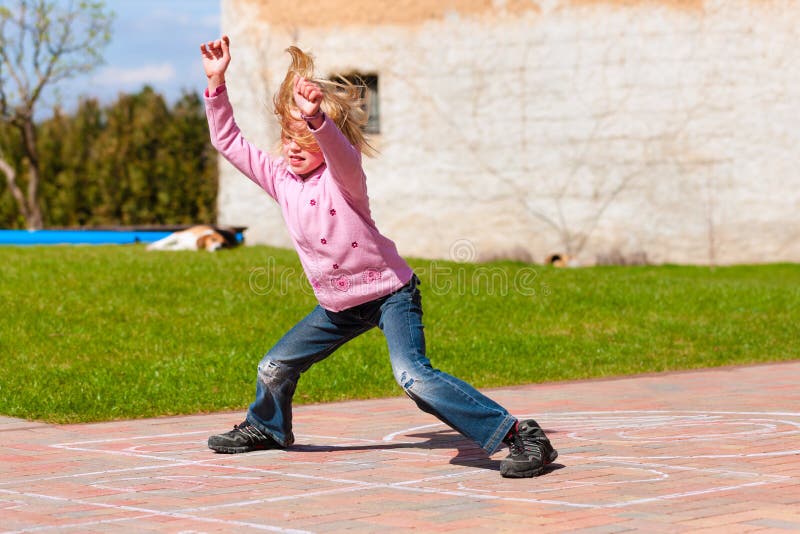 Girl Playing in Spring Garden Having Fun Stock Image - Image of blue ...