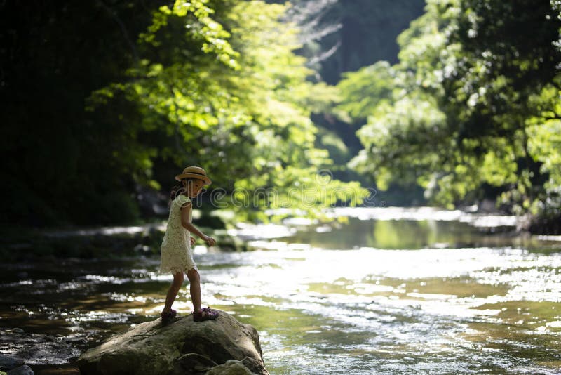 Cute Girl Playing in a Beautiful Mountain Stream Stock Photo - Image of ...