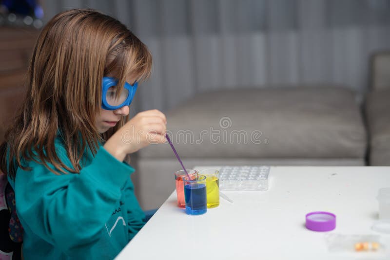 Girl playing to mix colors stock photo. Image of blue - 63961024