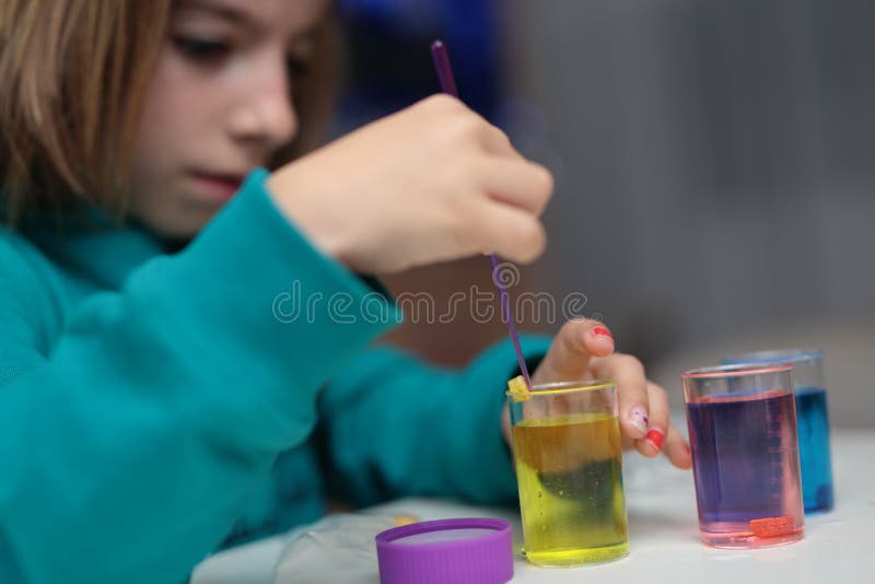 Girl playing to mix colors stock photo. Image of laboratory - 63961068