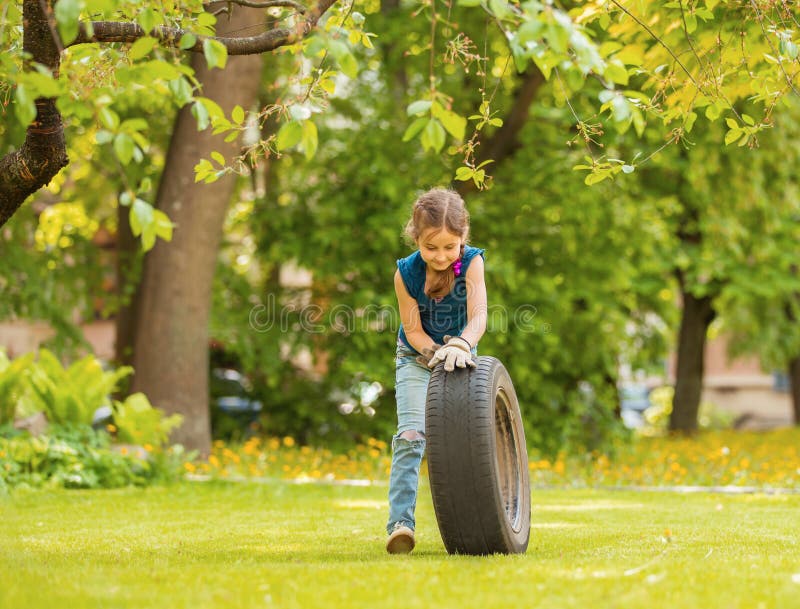 Girl Playing with the Wheel of the Car Stock Photo - Image of forest ...