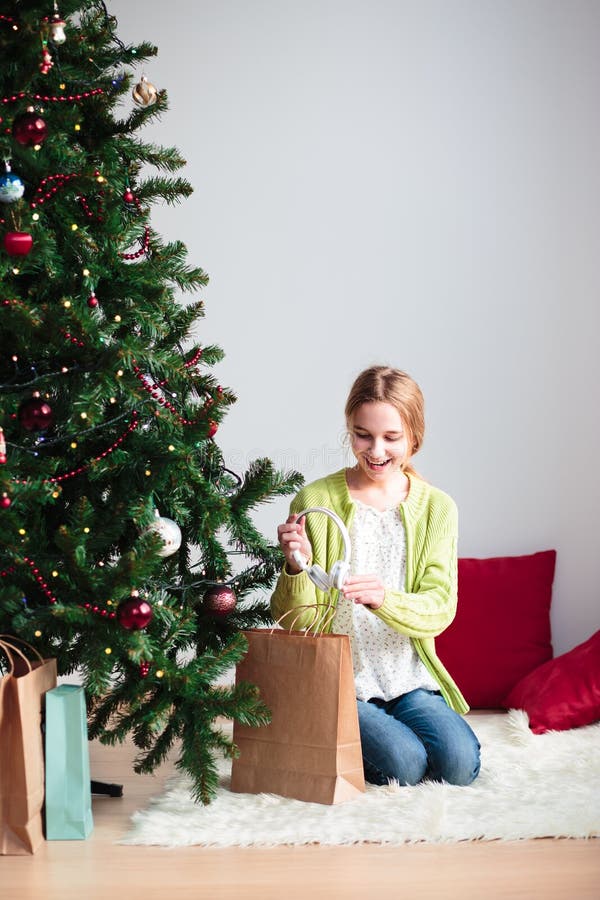 Girl Pleasantly Surprised at Christmas Gift Stock Image - Image of ...