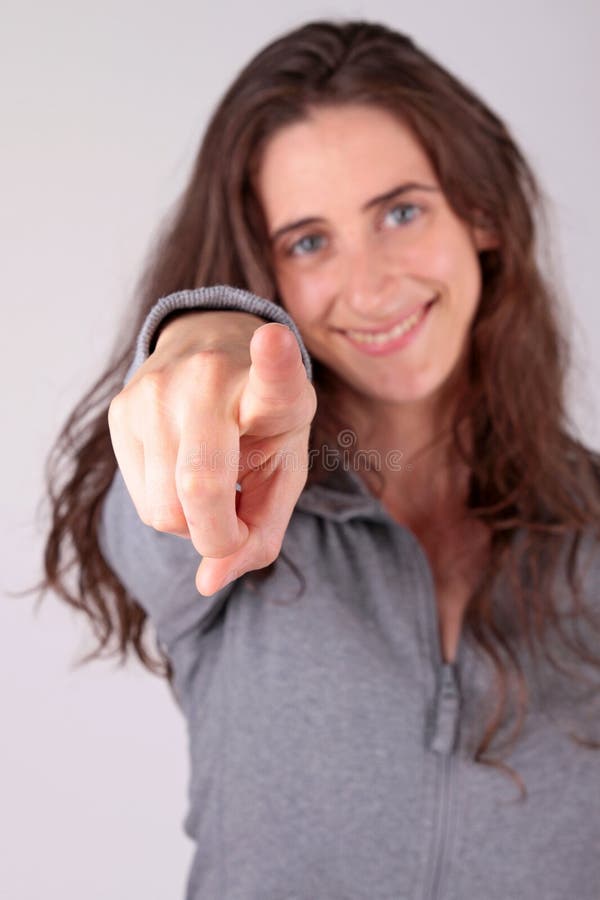 Girl pointing at you stock photo. Image of finger, confident - 25465062