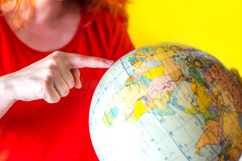 Girl Points To a Place on the Globe Stock Photo - Image of physical ...