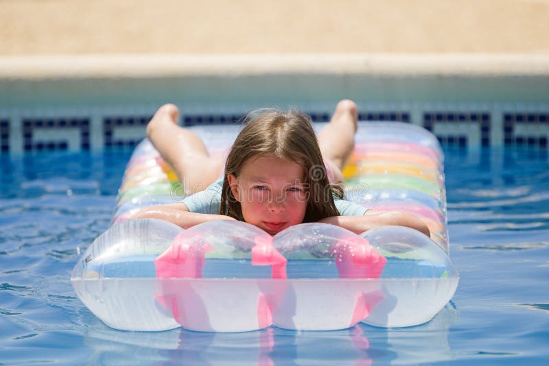 Child Girl Water Inner Tube Stock Photo - Image of pool, floating: 39928440