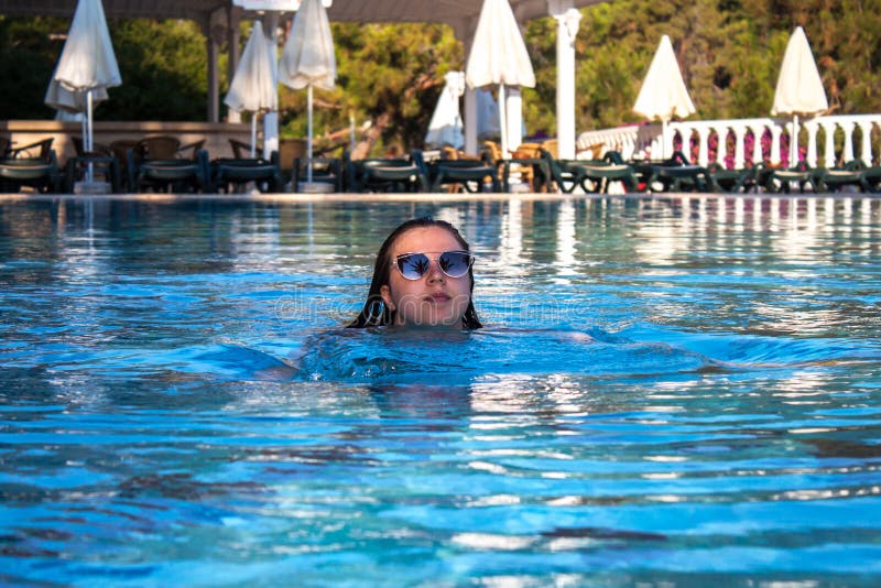 Girl in the pool stock photo. Image of relax, pool, woman - 109200708