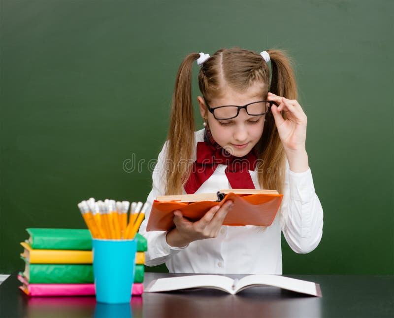 Girl with Poor Eyesight Reading a Book Stock Image - Image of book ...