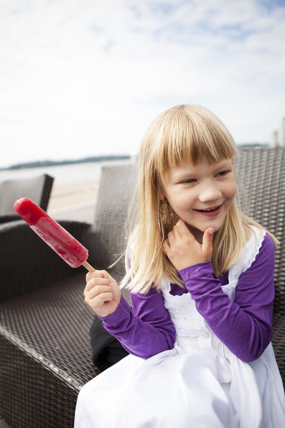 Girl with popsicle stock photo. Image of stick, food - 26046420