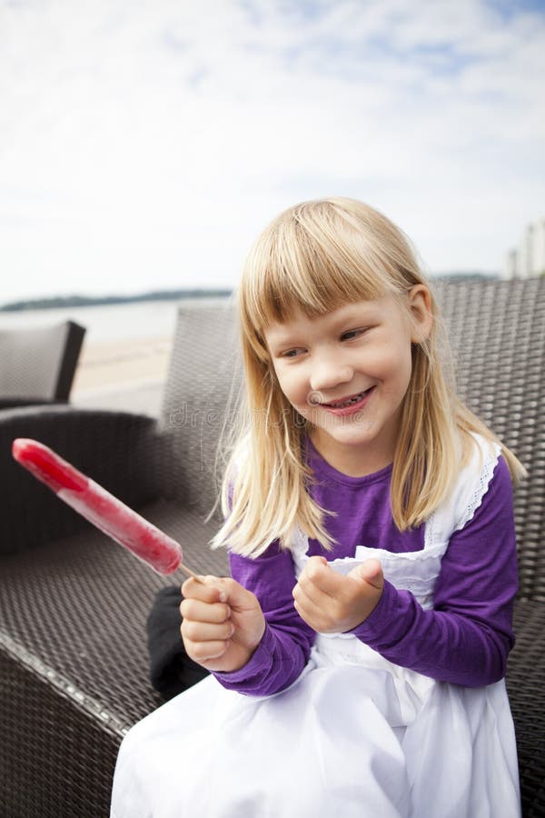 Girl with popsicle stock image. Image of frozen, cute - 26567175