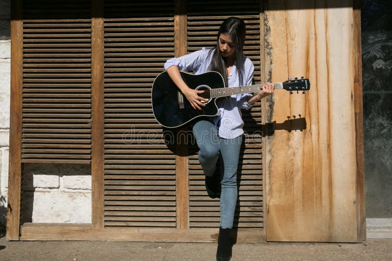 Girl pose with a guitar stock image. Image of hipster - 80936185