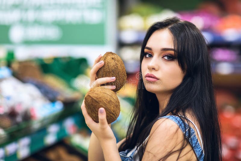 Girl with Coconuts at a Beach Stock Photo - Image of palm, panoramic ...