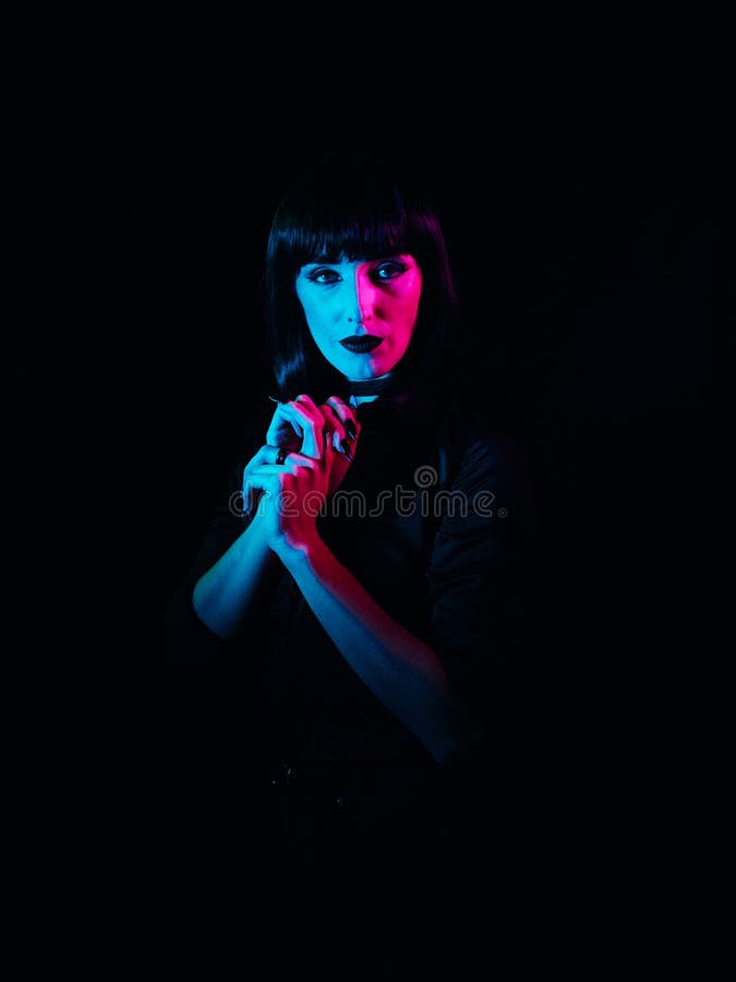 Girl Posing with Colored Light Stock Image - Image of beauty, hands ...