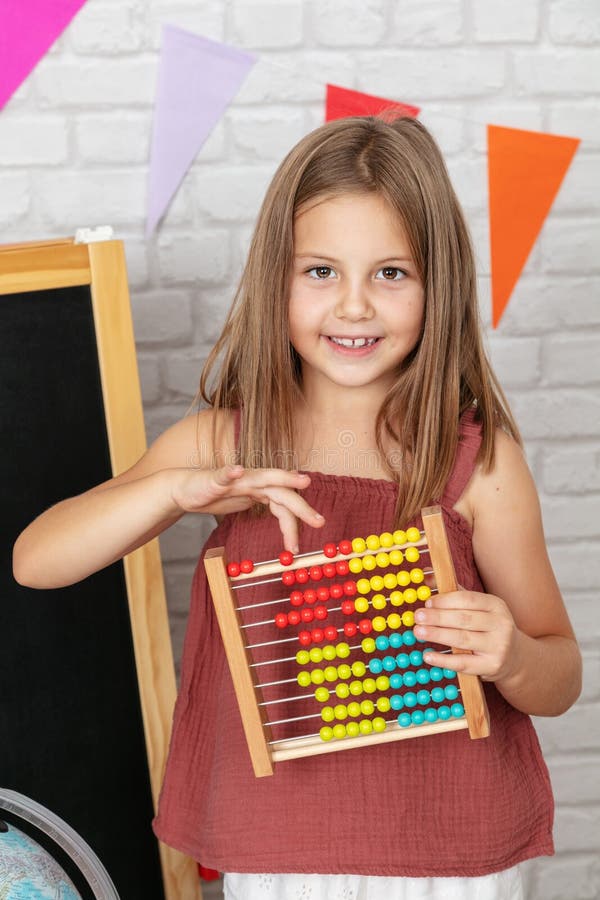 Girl Posing for the First Day at School Stock Photo - Image of back ...