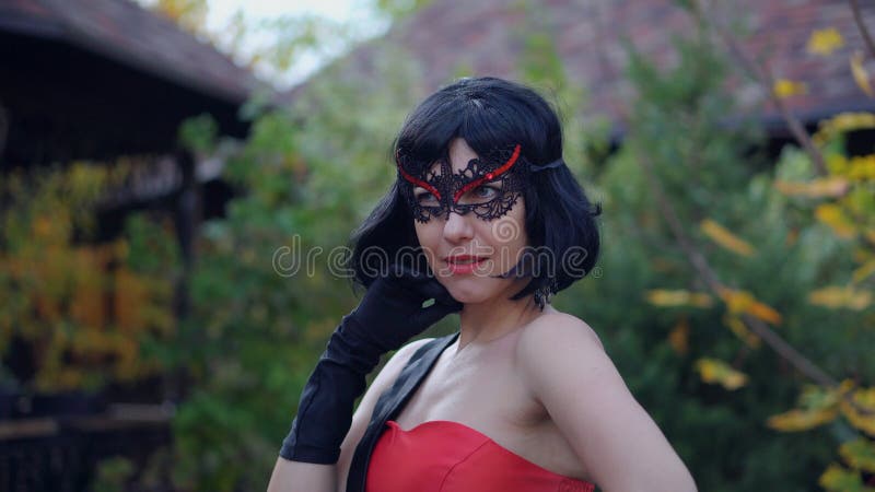 Girl posing in a vamp mask stock video. Video of fetishdeluxe - 213470677