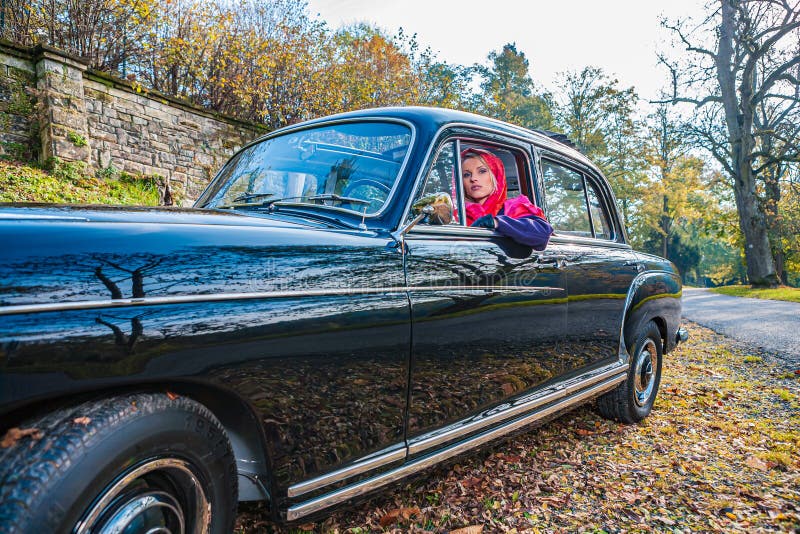 Woman and classic car stock image. Image of vintage, revival - 11318823
