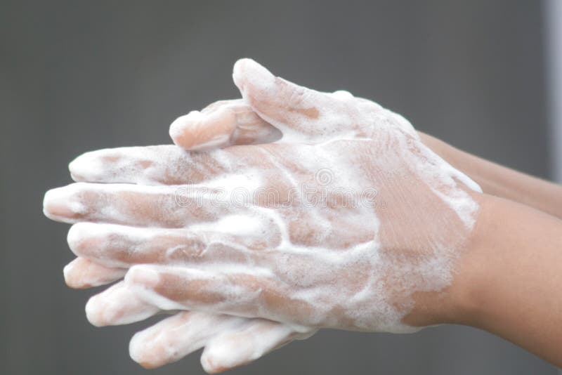 A Girl Practicing Proper Hygiene by Washing Hands Using Soap Water ...