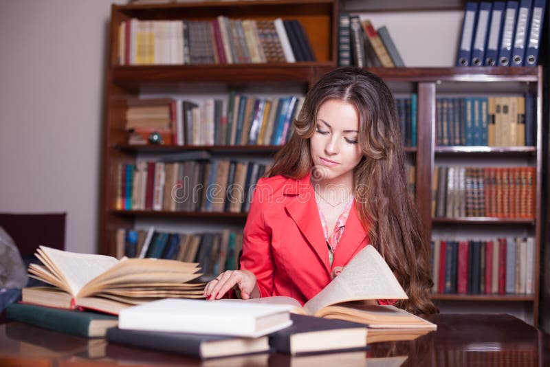 Girl is Preparing for the Exam in the Library Reads Books Stock Photo ...