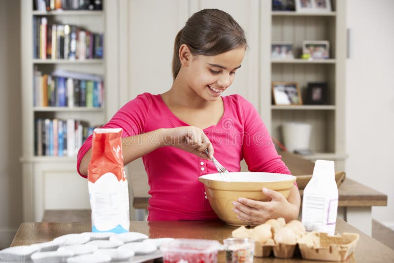 Girl Preparing Ingredients To Bake Cakes in Kitchen Stock Image - Image ...