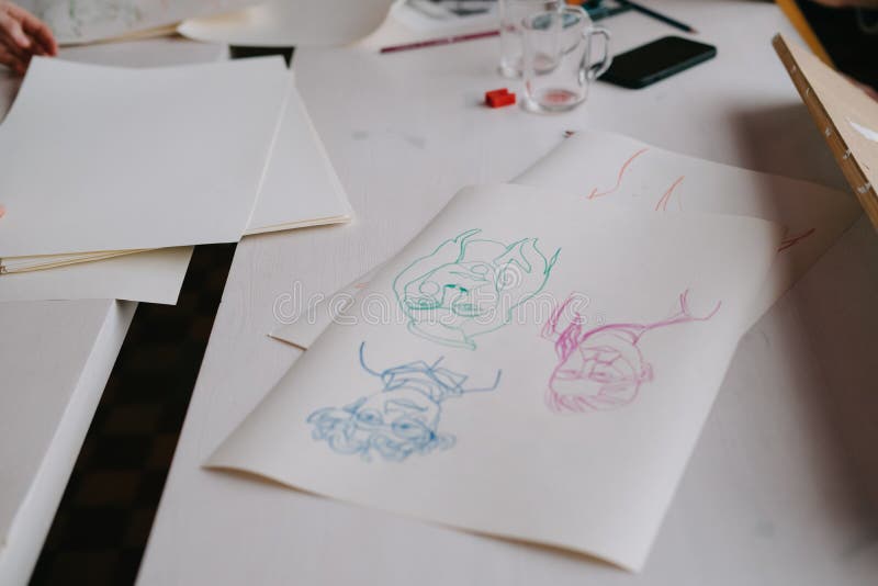 The Girl is in the Process of Drawing. Sketching with a Colored Pencil ...