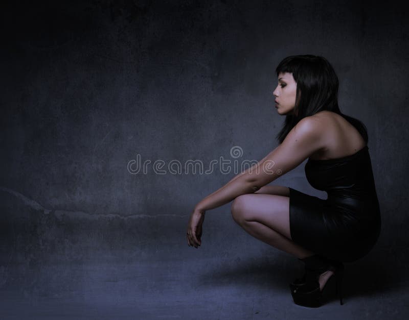 Girl in a Profile Side Squatting and Looking Stock Image - Image of ...