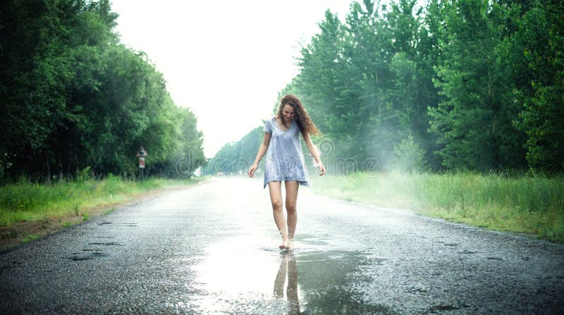 Girl in a puddle stock photo. Image of happiness, happy - 42643544