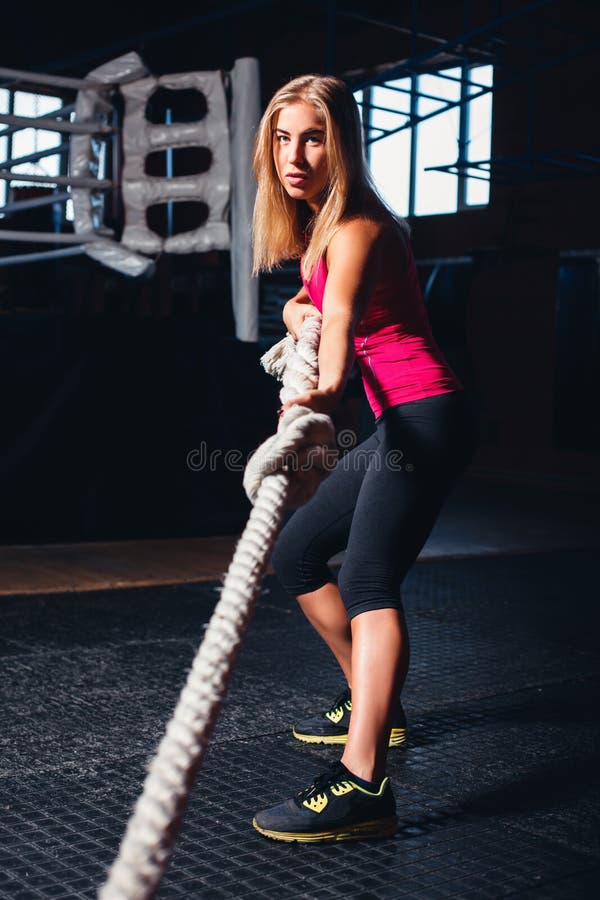 Girl pulling rope stock image. Image of gymnastics, pulls - 80463847