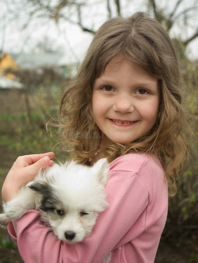 Girl and puppy stock photo. Image of young, cute, portrait - 14335946