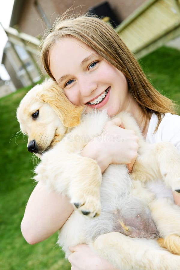 Girl with puppy stock image. Image of cute, adolescent - 14668675