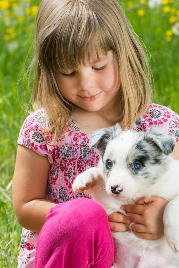 Girl with puppy stock image. Image of infant, border - 41030861