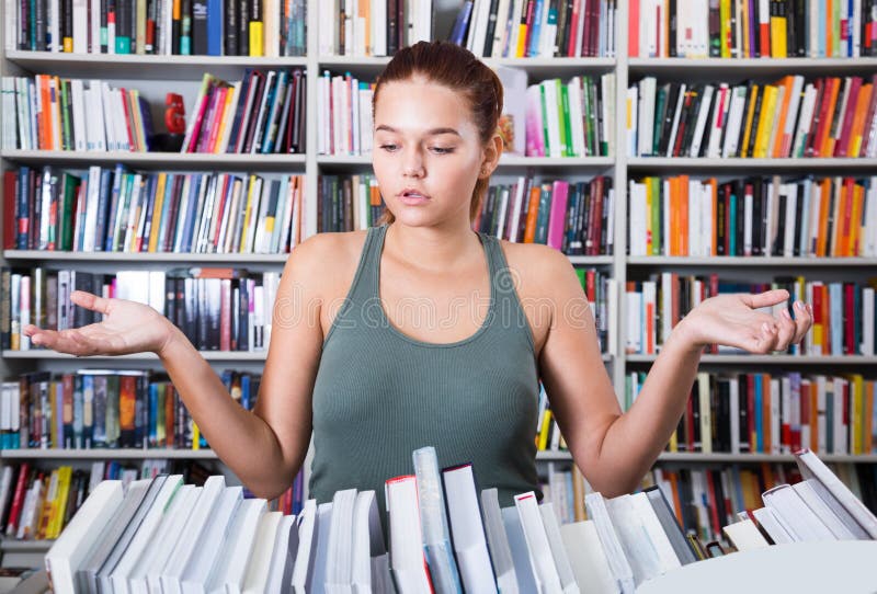 Girl Puzzled Choice Books Library Stock Photos - Free & Royalty-Free ...