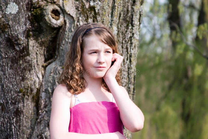 A Girl Puzzled about Something Stock Photo - Image of puzzled, unsure ...
