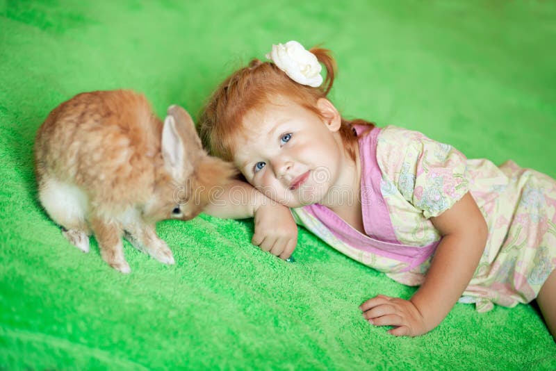 Girl with rabbit stock photo. Image of genuine, caring - 26444922