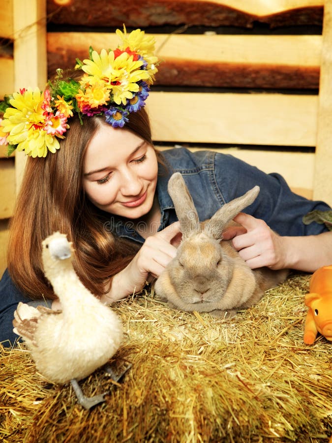 Girl with Rabbit stock image. Image of flowers, looking - 31096765