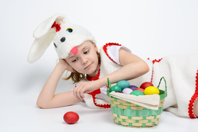 Girl in Rabbit Costume with a Basket of Easter Eggs Stock Photo - Image ...
