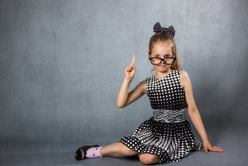 Girl with a raised finger stock image. Image of pretty - 50595941