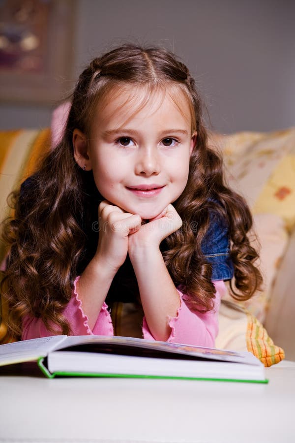 Girl reading book stock photo. Image of school, people - 7514424