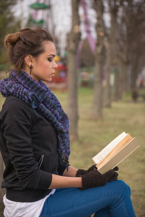 Girl reading a book stock photo. Image of laughing, college - 50348642