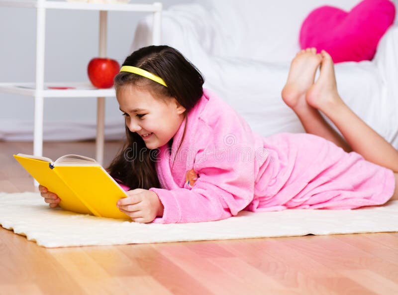 Girl is reading a book stock photo. Image of female, childhood - 48409028