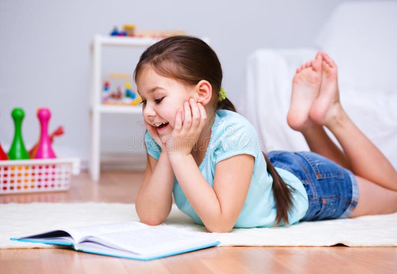 Girl is reading a book stock image. Image of girl, lesson - 48409041