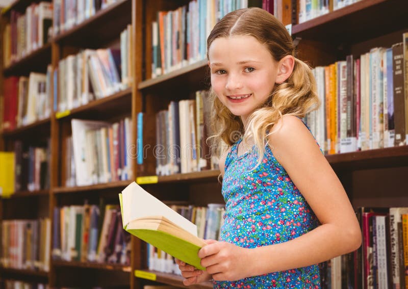 Girl Reading Book in Library Stock Image - Image of happy, bookcase ...
