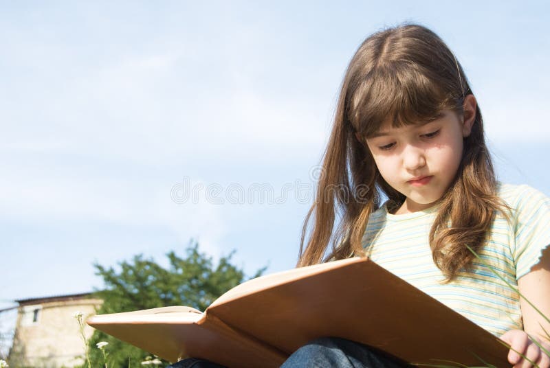 Children reading a book stock photo. Image of alone, inspiration - 10215016