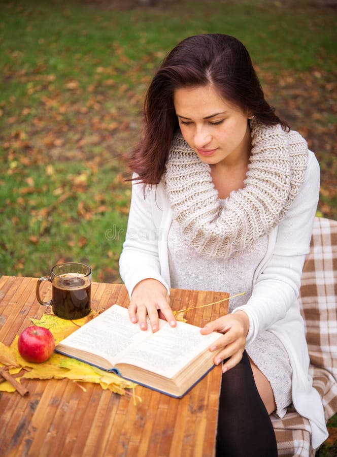 Girl Reading a Book Outside in Autumn Stock Photo - Image of brunette ...
