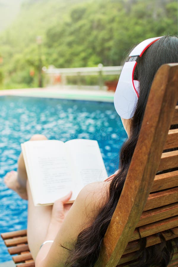 Girl Reading a Book by the Pool Stock Image - Image of holiday ...
