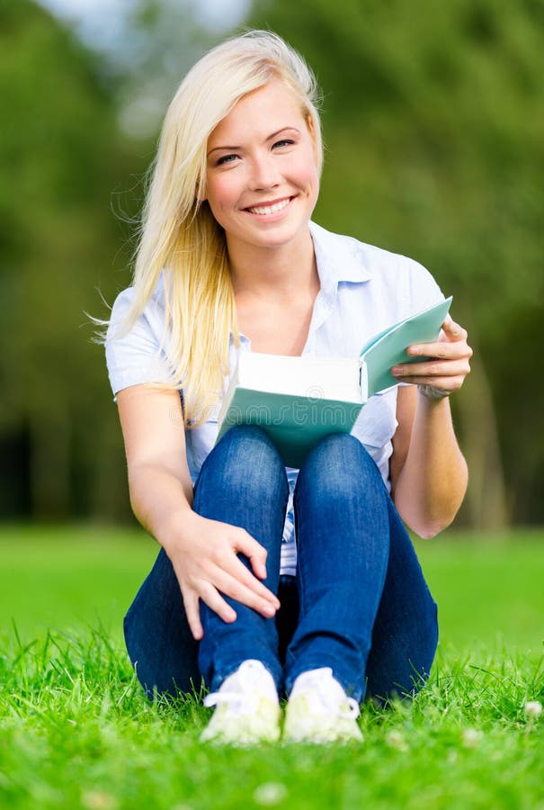 Girl Reading Book Drinks Tea at the Bar Stock Photo - Image of color ...
