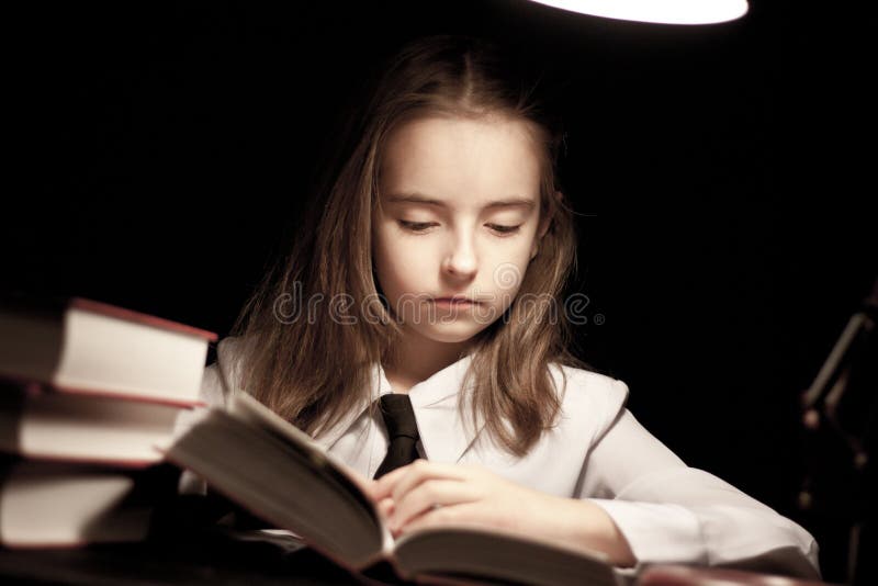 Girl Reading Book Under Lamp Stock Photo - Image of education, lamp ...