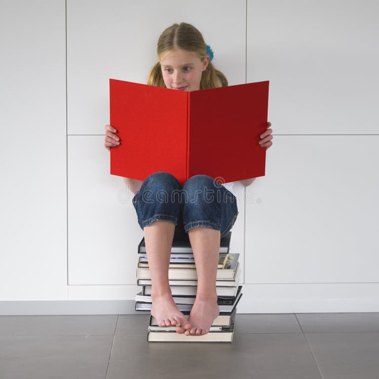 Girl Reading an Exciting Book Stock Image - Image of seat, staple: 2191557