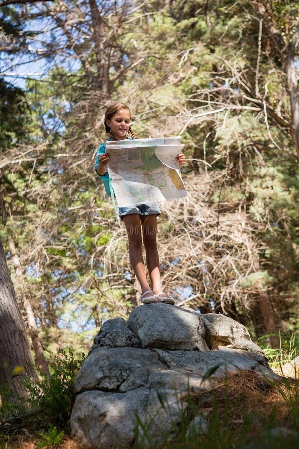 Girl Reading the Map in the Forest Stock Photo - Image of caucasian ...