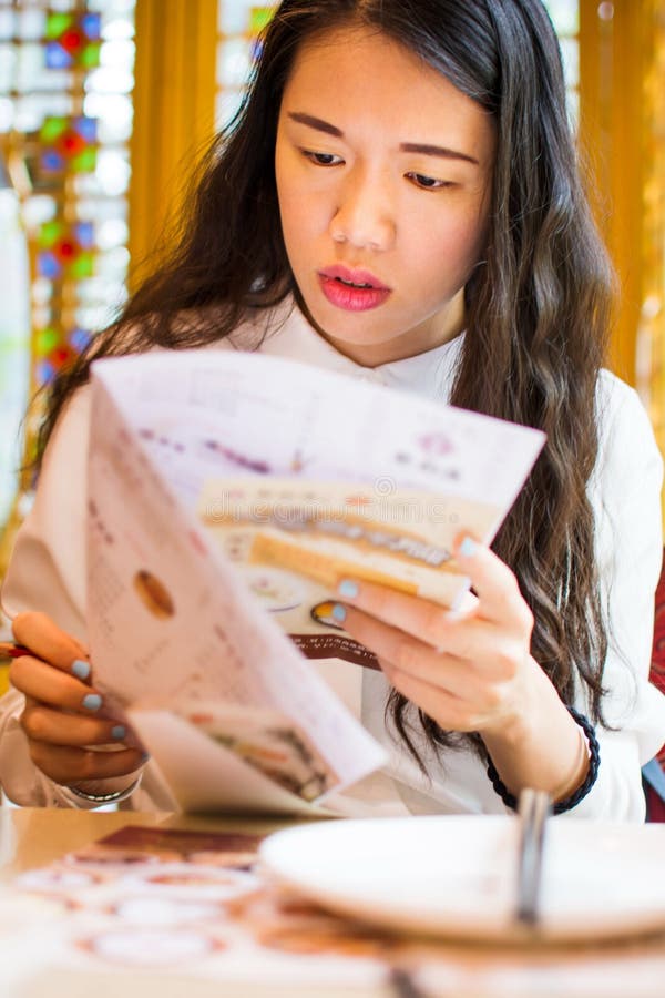 Girl Reading Menu at Chinese Restaurant Stock Image - Image of china ...