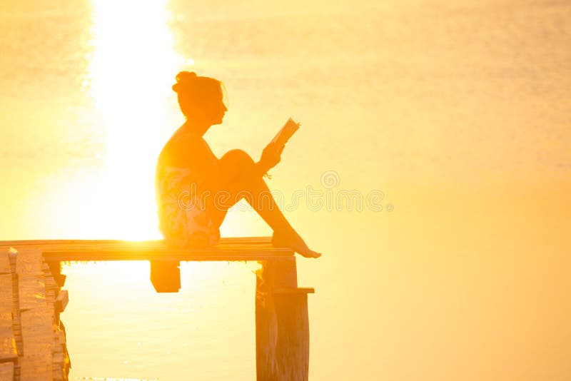 Girl Reading at the Sunset Time Stock Photo - Image of happy, adult ...